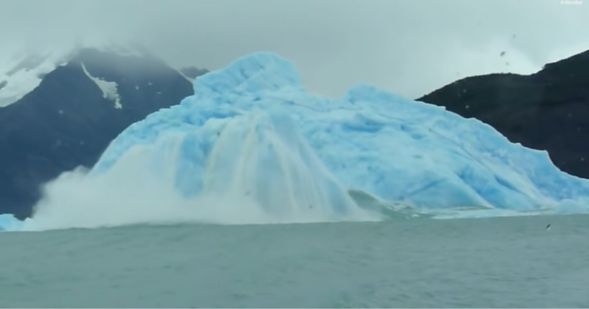 Footage Captures Enormous Iceberg Flipping Over In Sea - Small Joys