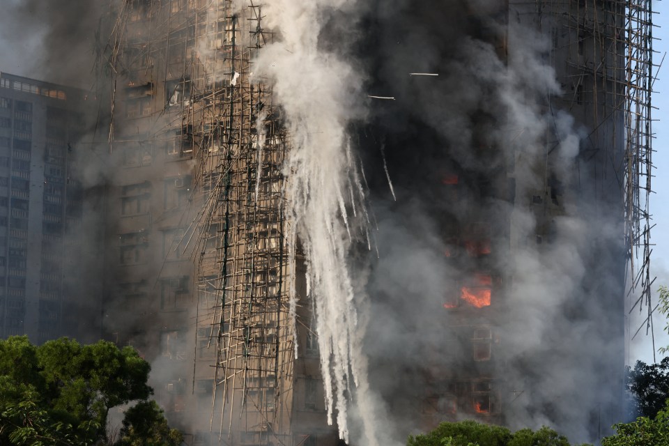 Horror fire engulfs 35-floor apartment building with residents trapped ...